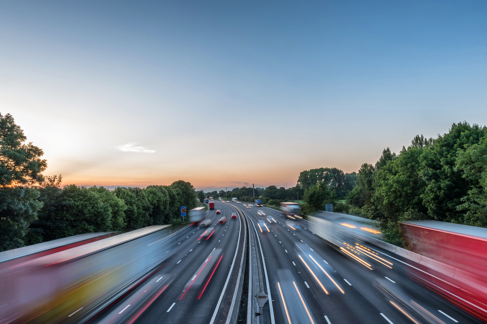 Sunset View Heavy Traffic Moving At Speed On Uk Motorway In Engl ...